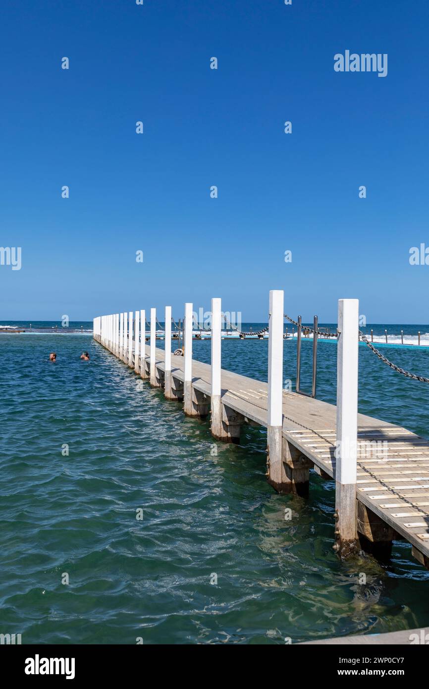 Narrabeen beach ocean pool rockpool on a blue sky autumn day in 2024 ...