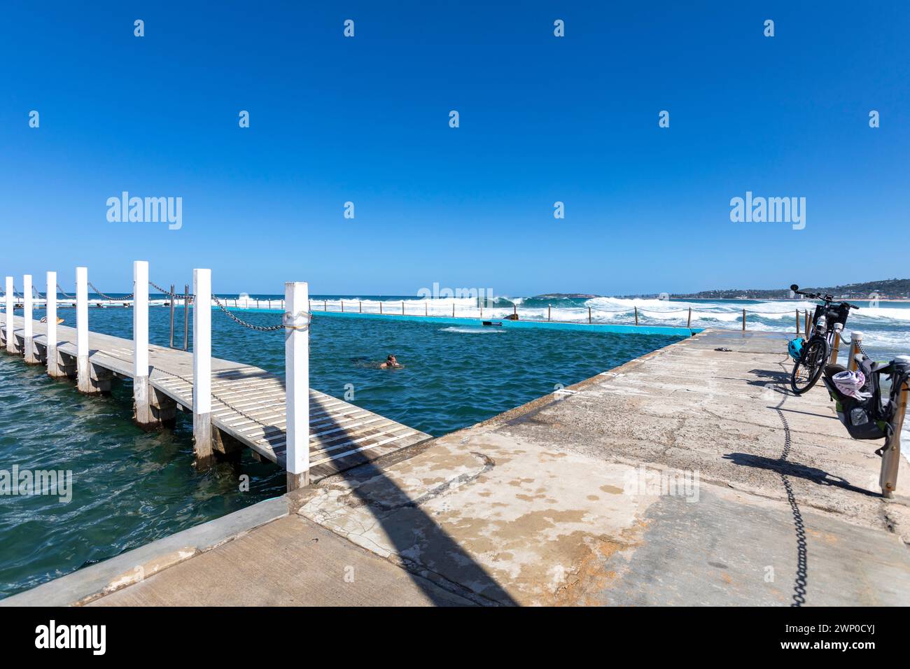 Narrabeen beach ocean pool rockpool on a blue sky autumn day in 2024 ...