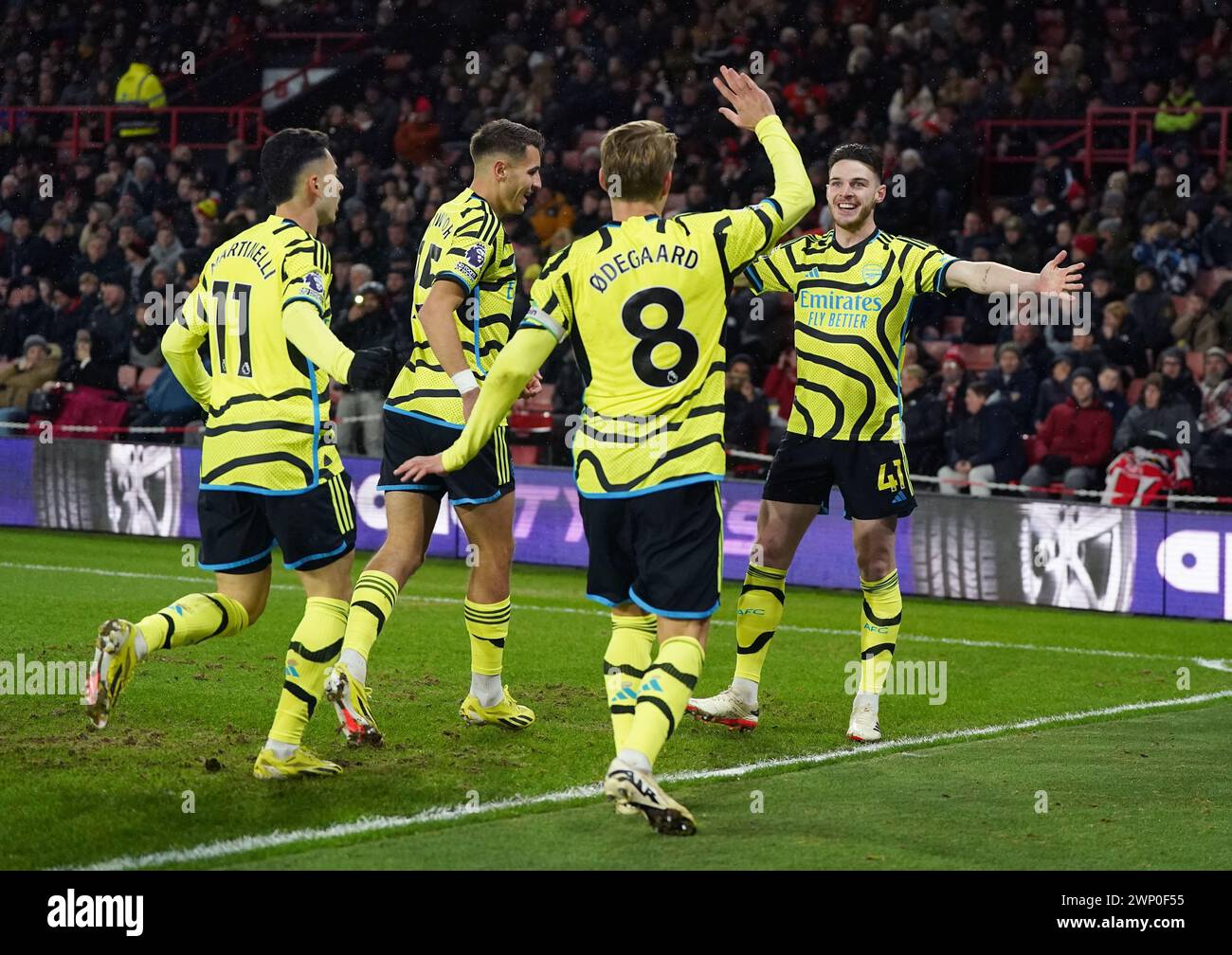 Arsenal's Martin Odegaard celebrates scoring their side's first goal of ...