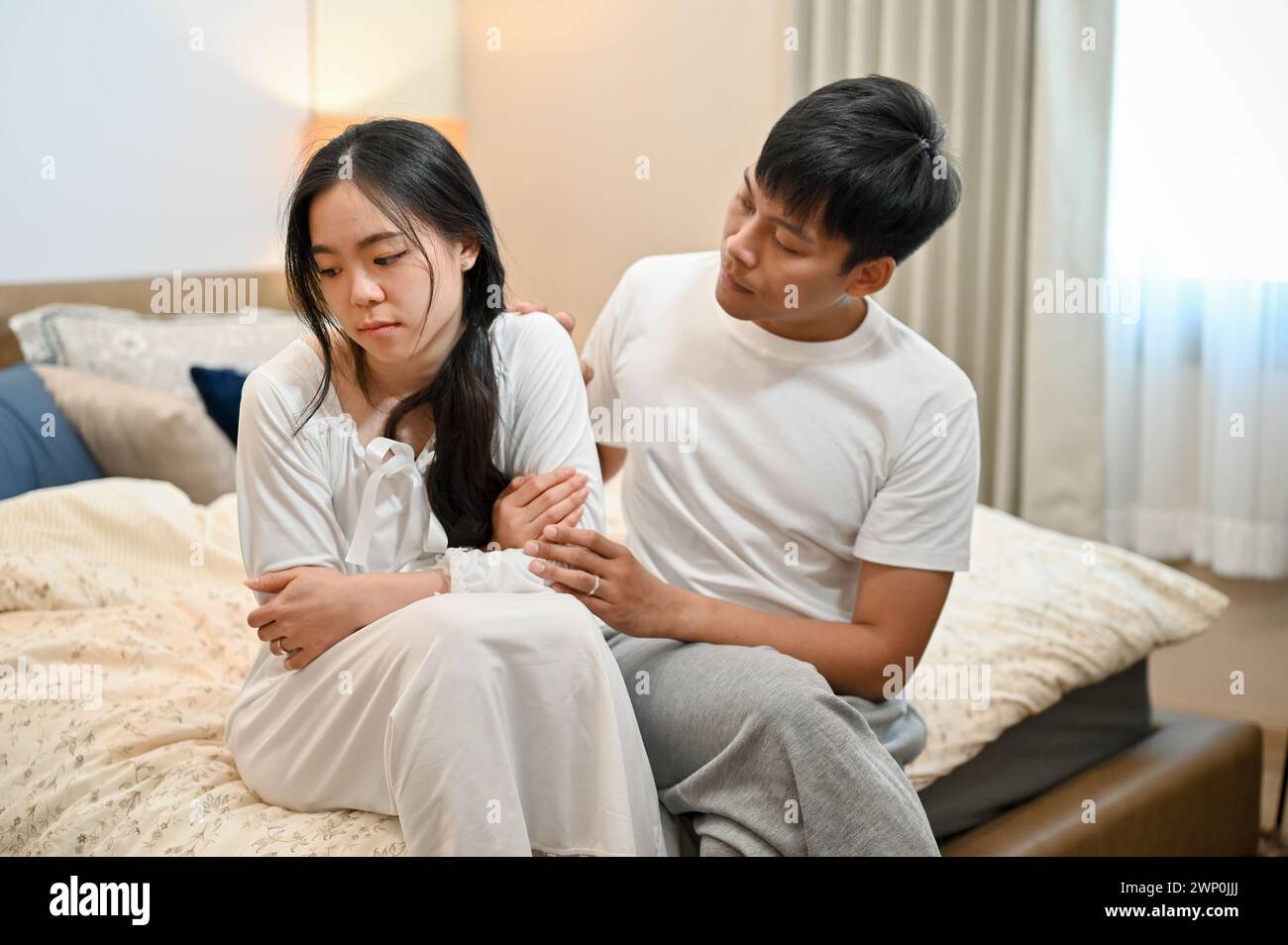 Young couple after quarrel talking hi-res stock photography and images - Alamy