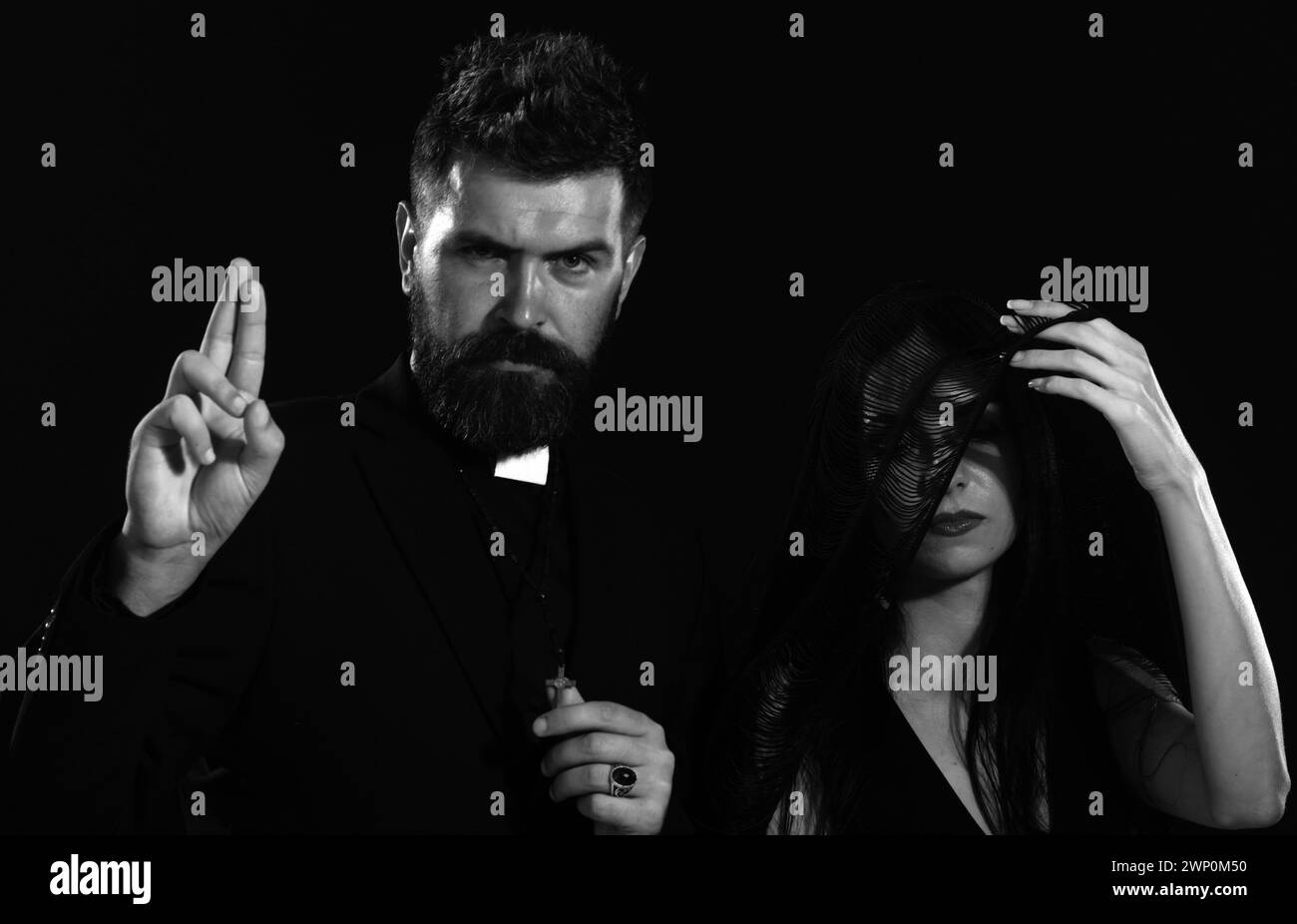 Funeral. Priest Blessing gesture. Pastor with woman-widow Stock Photo ...