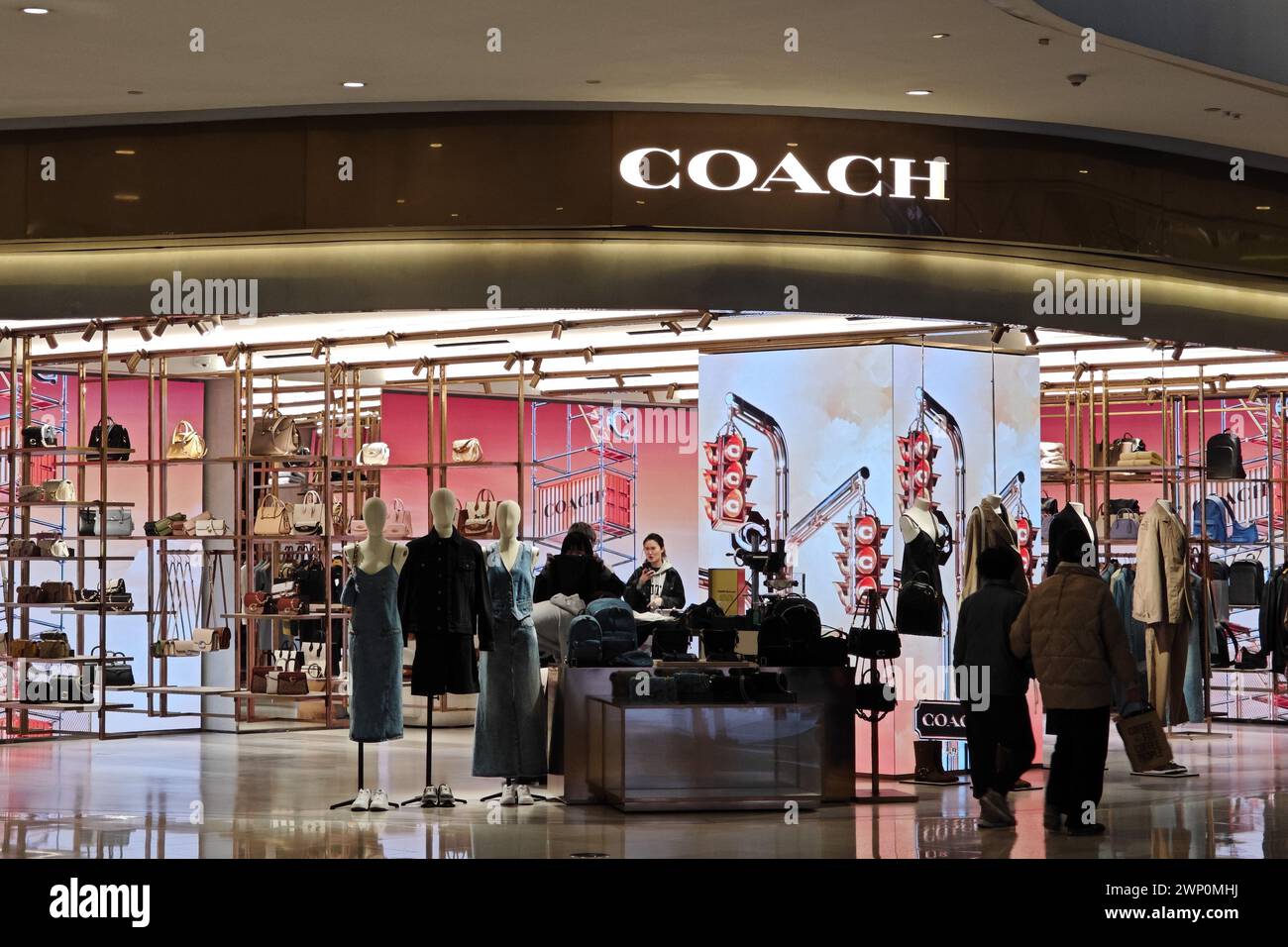 SHANGHAI, CHINA - MARCH 5, 2024 - Customers shop at a store of light ...