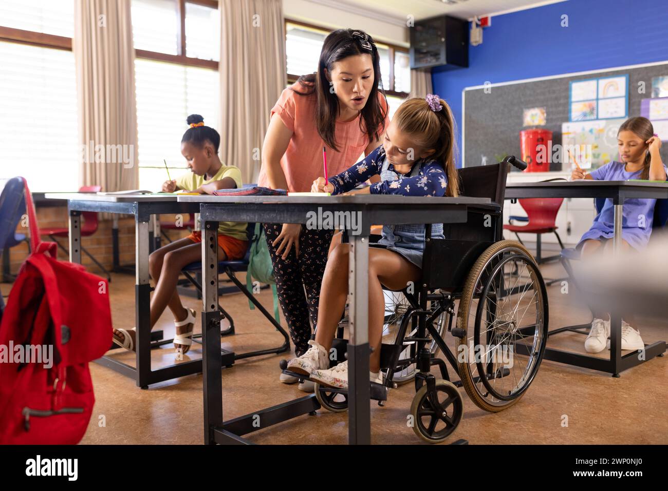 Children helping each other classroom hi-res stock photography and ...