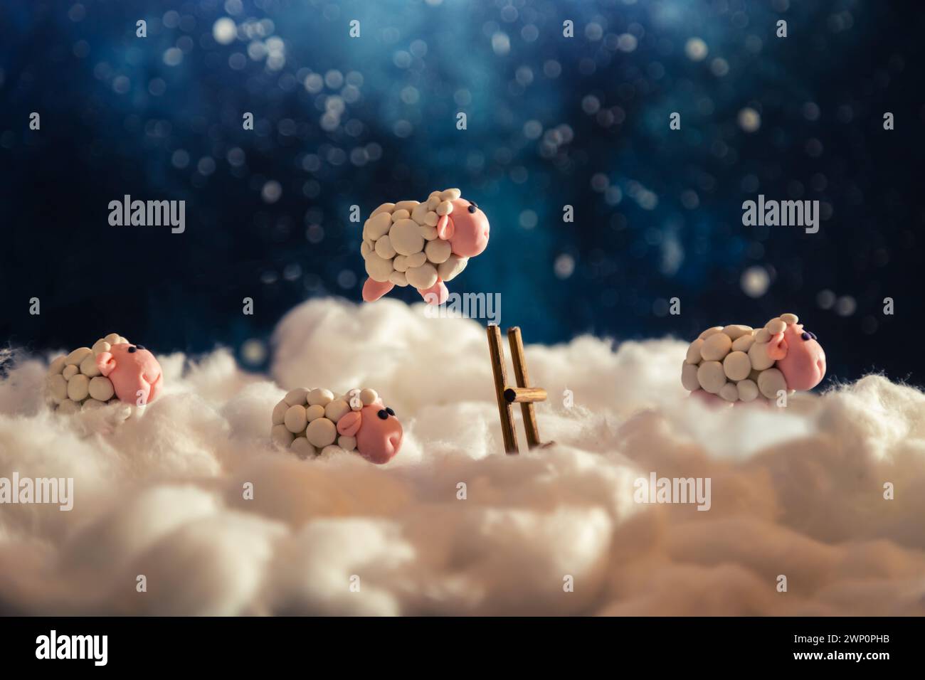 Cute plasticine sheep jumping over a fence in the clouds. Count sheep ...