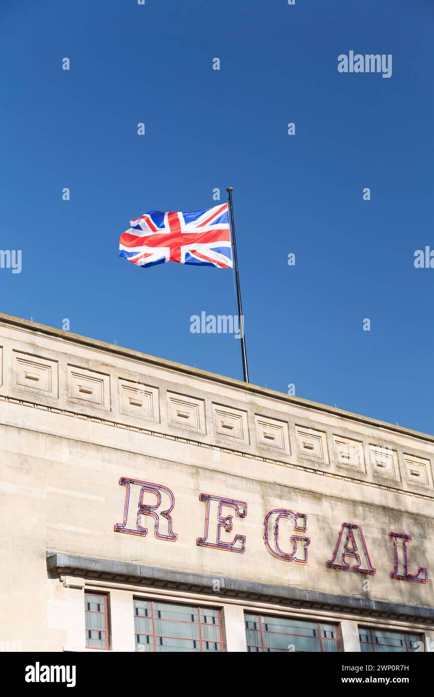 UK, Gloucester, Union flag flying above the art deco Regal building ...