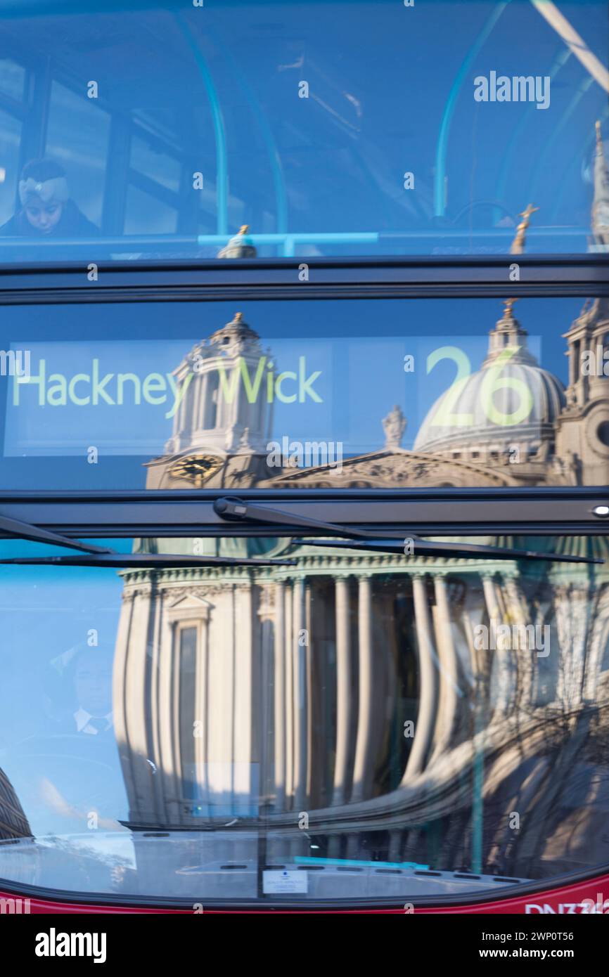 UK, London, Red London bus with reflection of St Pauls cathedral on ...