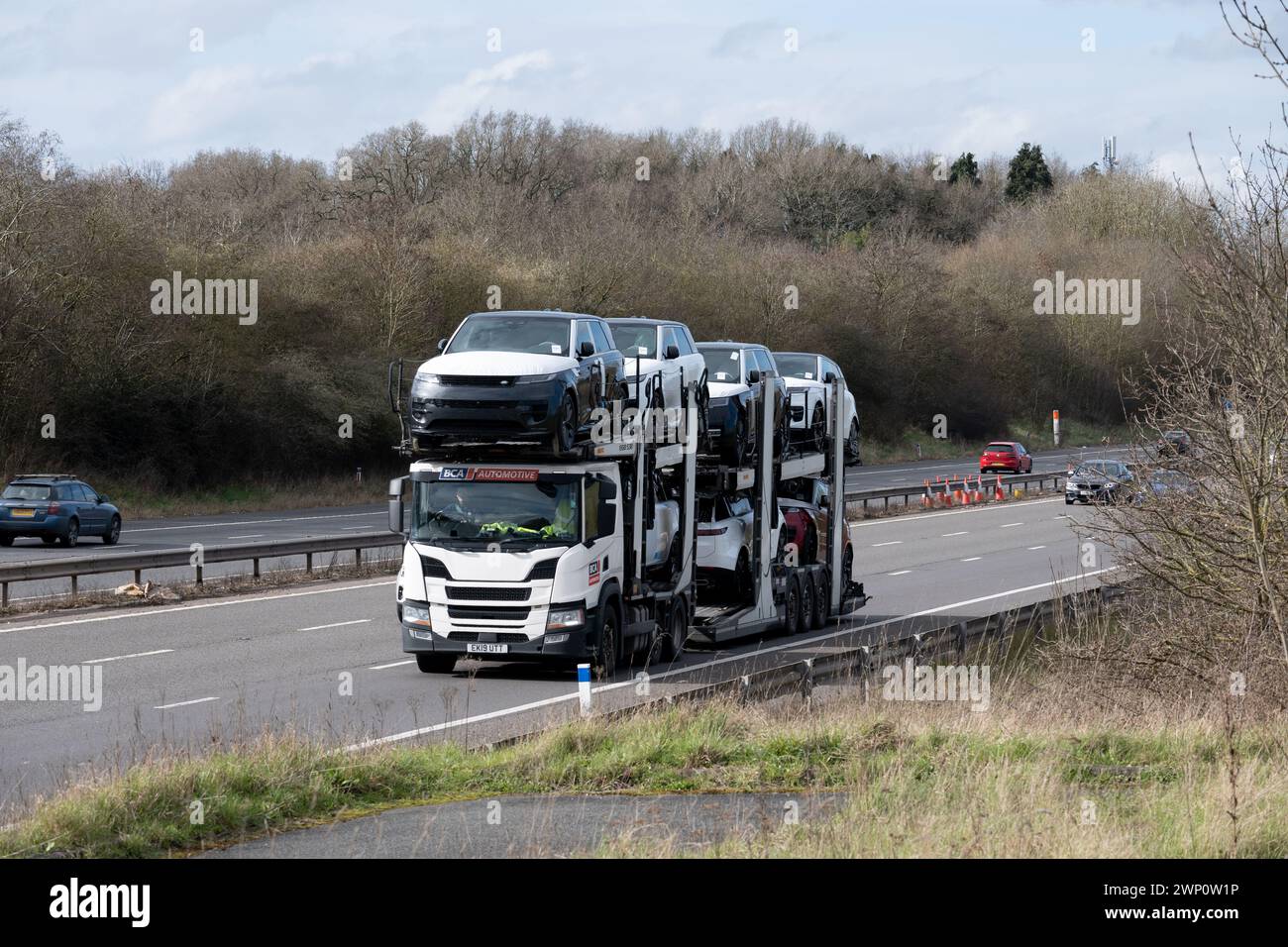 Truck carrying cars hi-res stock photography and images - Alamy