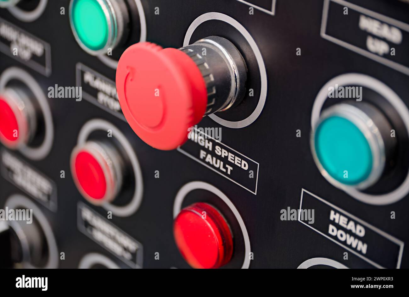 Black control panel with red and green round lamps and buttons ...
