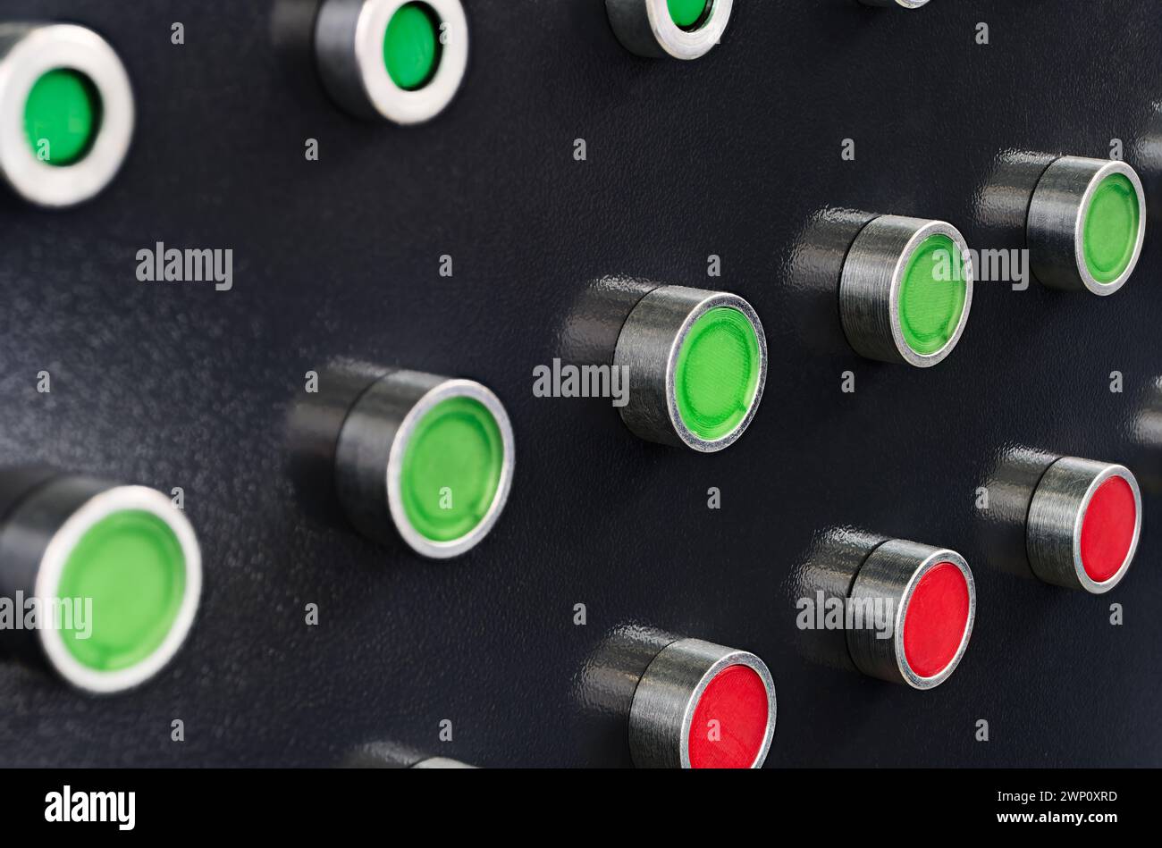 Black control panel with red and green round lamps and buttons ...