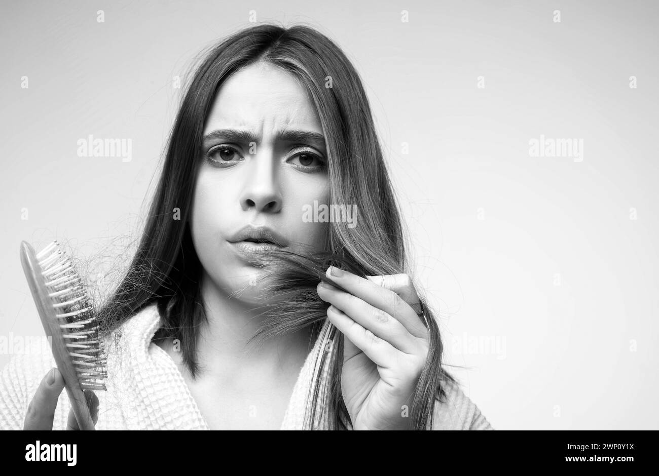 Hair loss. Woman is upset of hair loss. Portrait of sad girl with ...