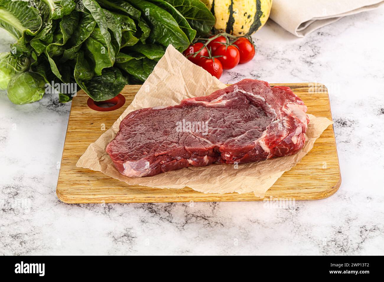 Raw rib eye beef premium steak for grill Stock Photo - Alamy