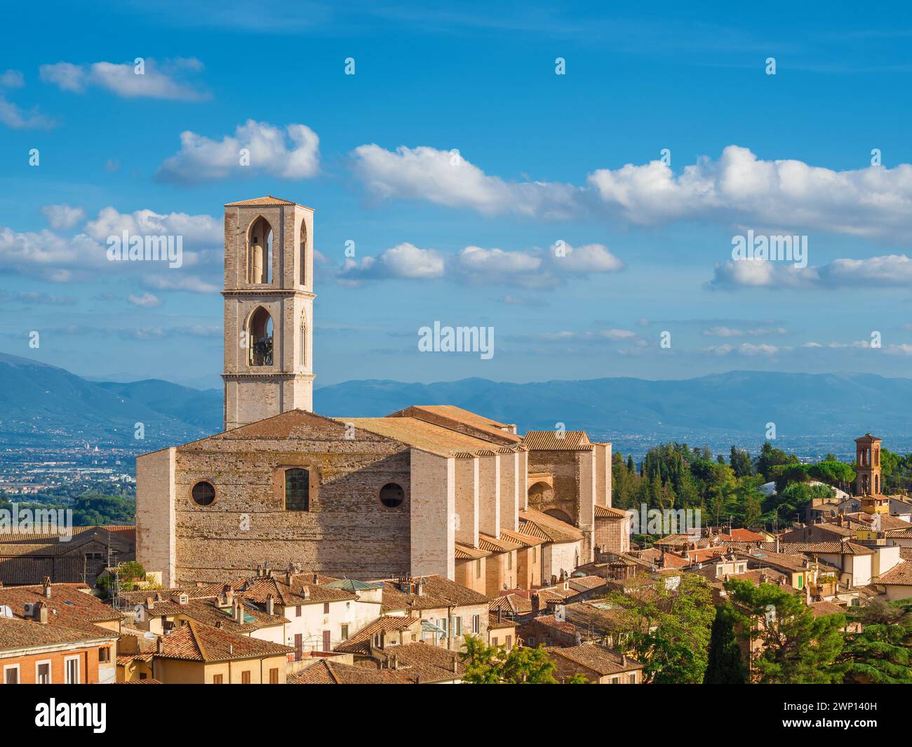 Perugia old skyline with medieval St Dominic Basilica and Umbria ...