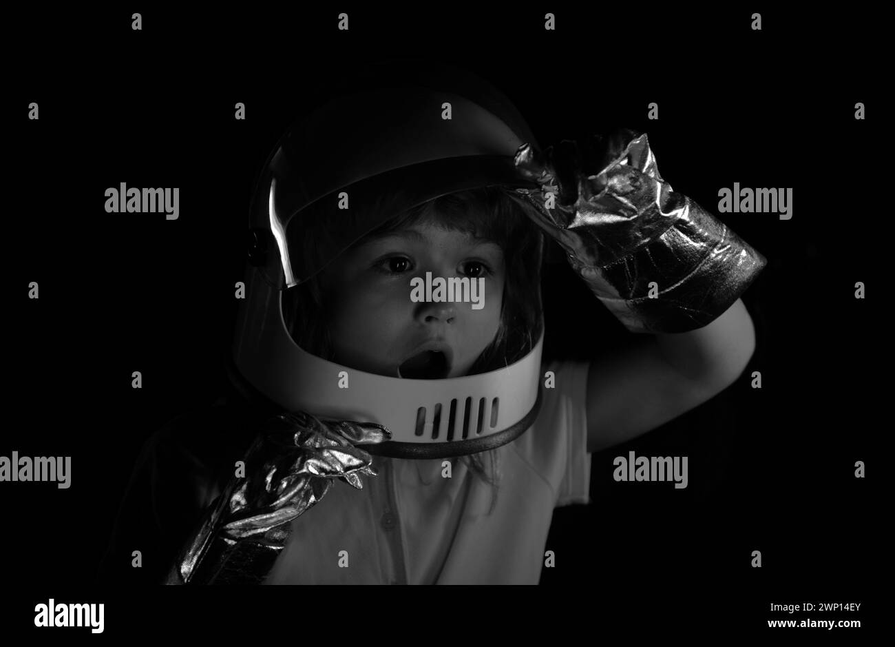 A little boy dreams of becoming an astronaut and flying into space ...