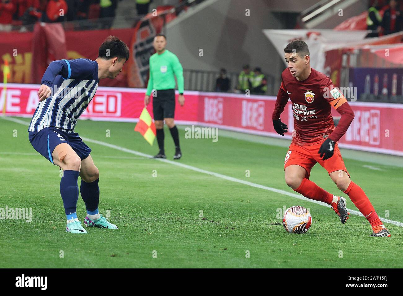 Shanghai Port Football Club defeated Wuhan Three Towns Football Club ...