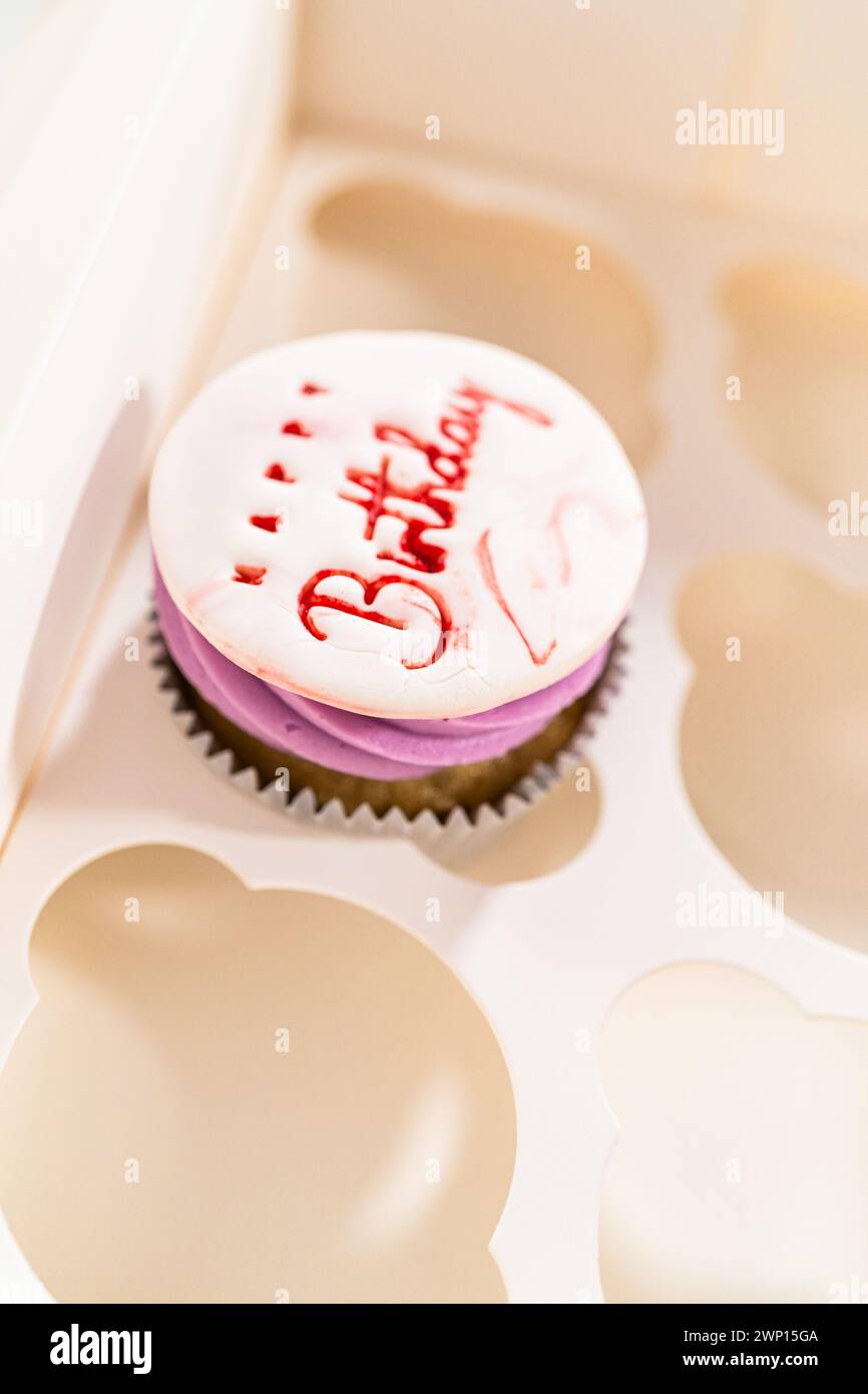 Creating Extravagant Cupcakes for Birthday Celebration Stock Photo - Alamy