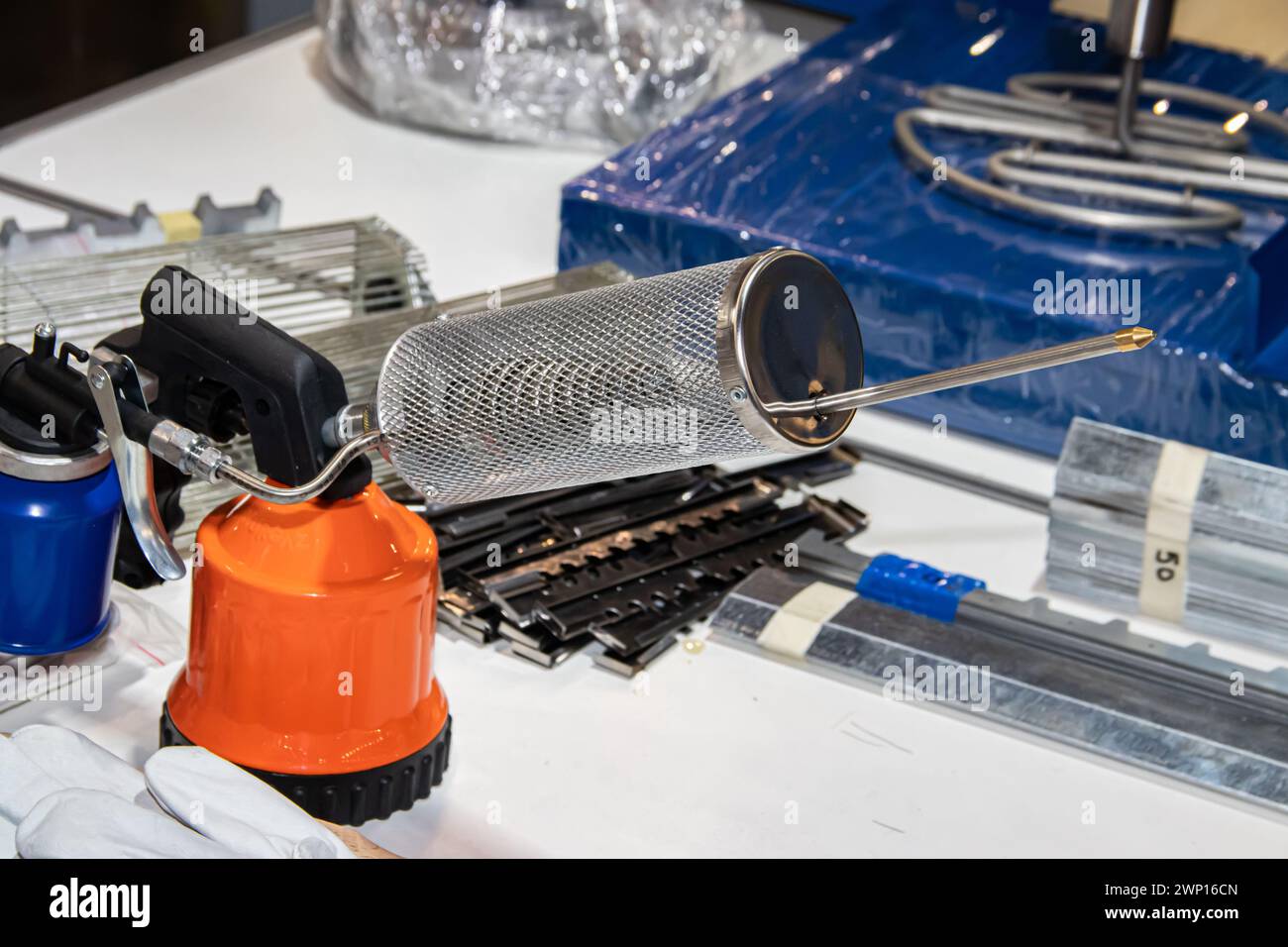 Bees smoker beekeeping tool works with bees near the hives, equipment ...