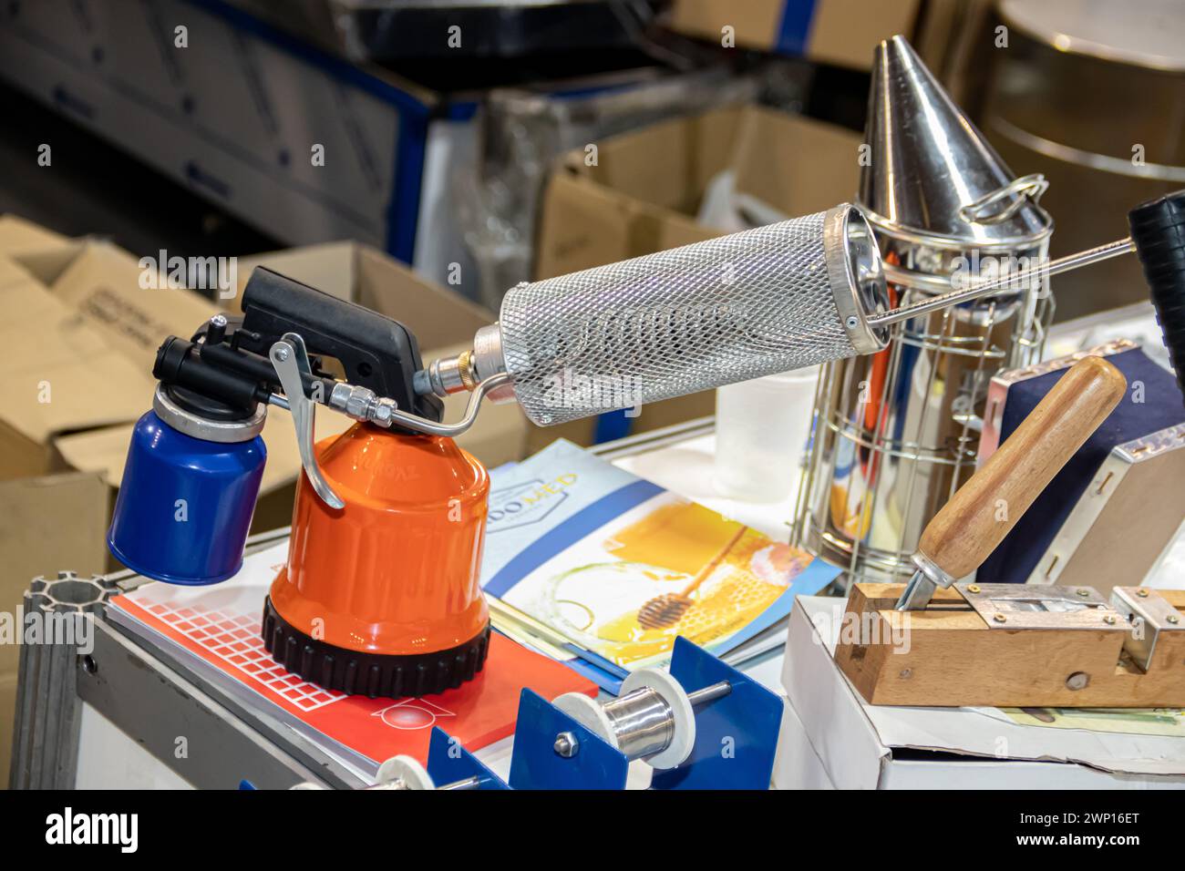 Bees smoker beekeeping tool works with bees near the hives, equipment ...