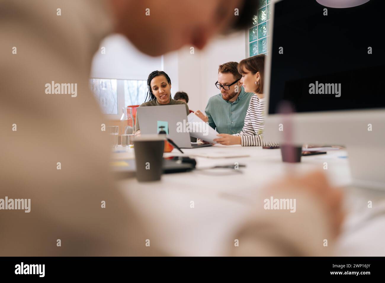 Modern corporate office open space with busy male and female staff ...