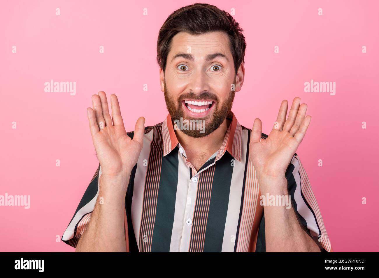 Photo of astonished cheerful person toothy smile raise opened arms ...