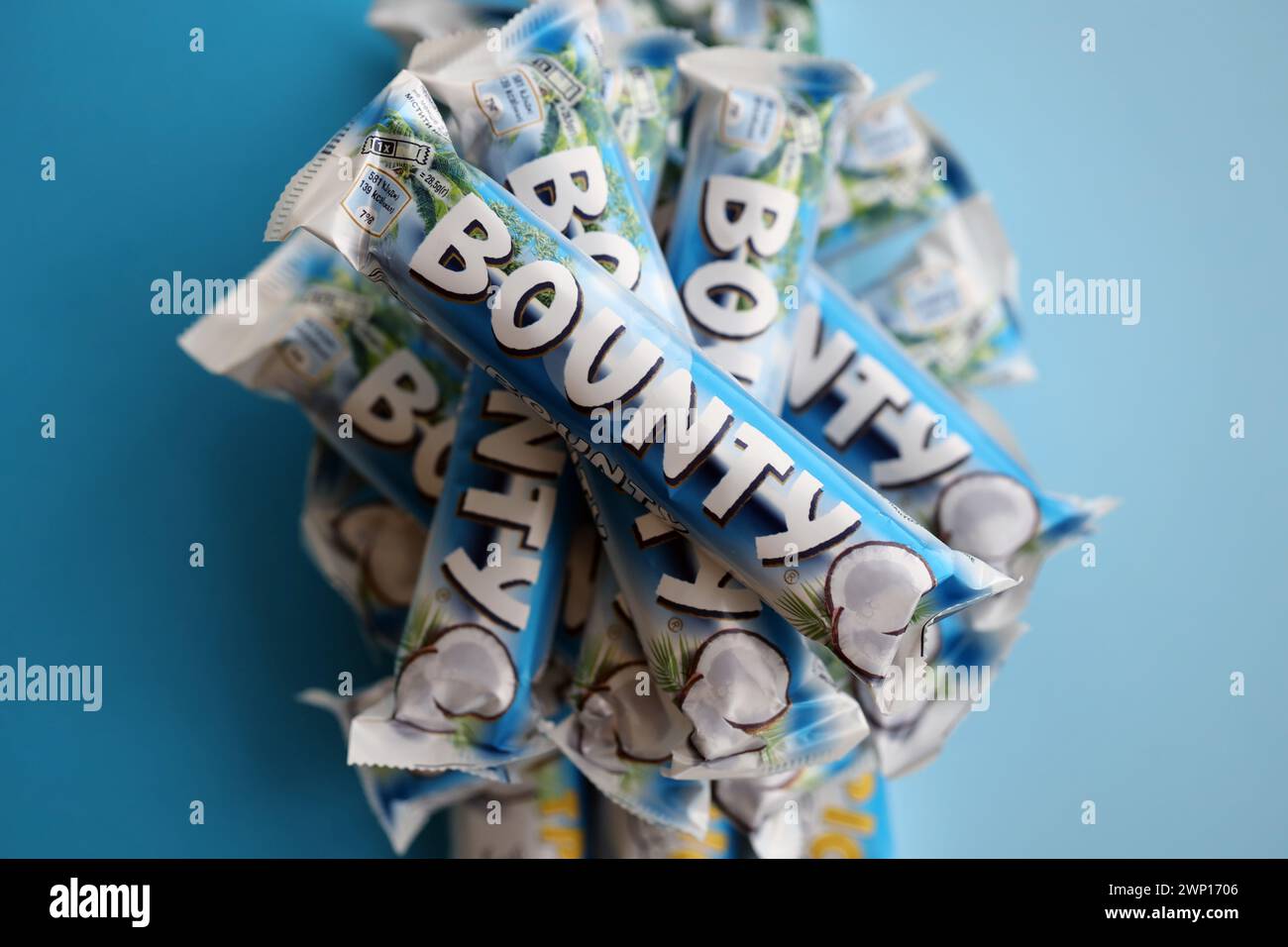 KYIV, UKRAINE - OCTOBER 31, 2023 Bounty chocolate bars with cocoa ...