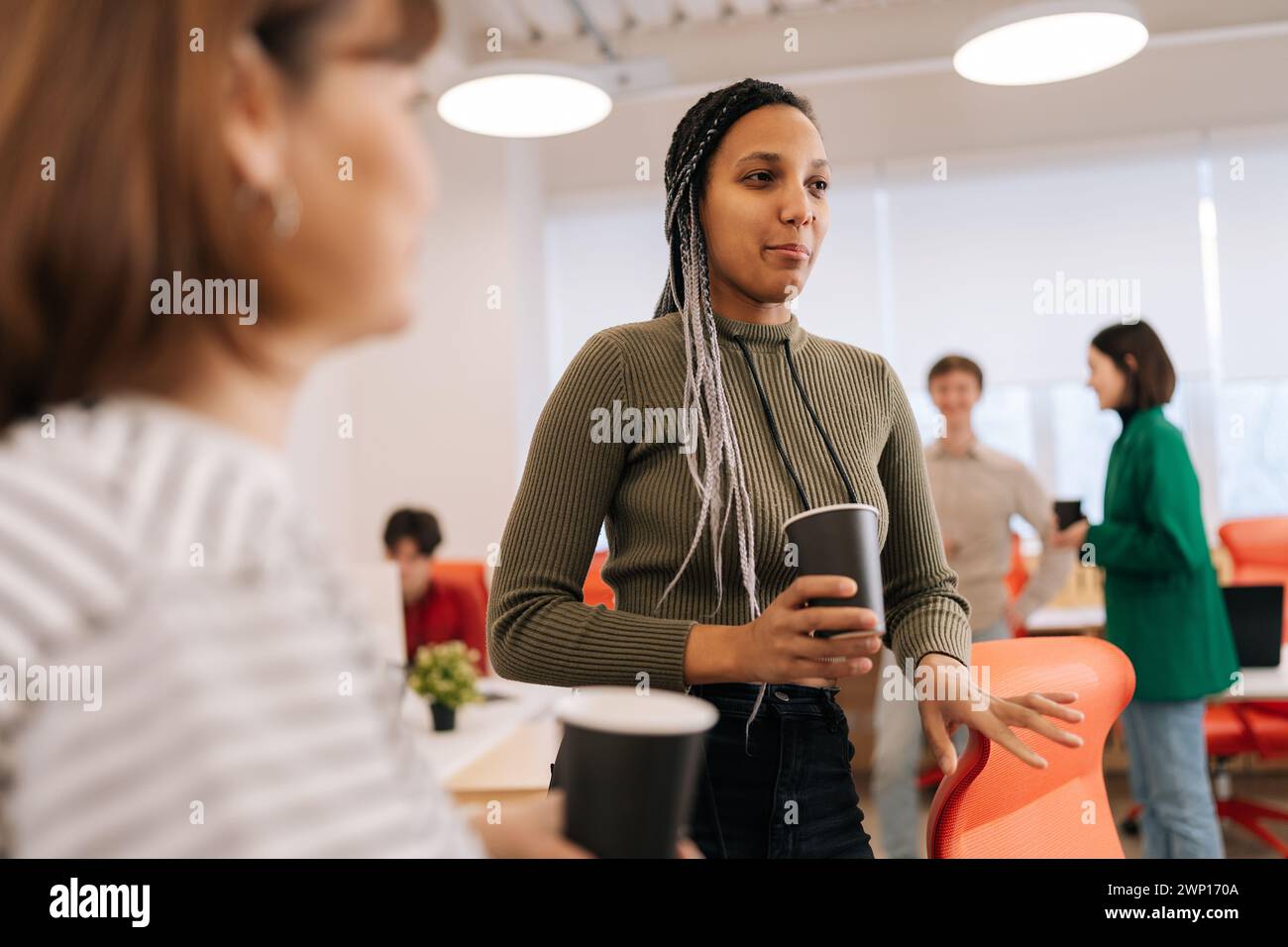 Modern corporate office open space with busy male and female staff ...