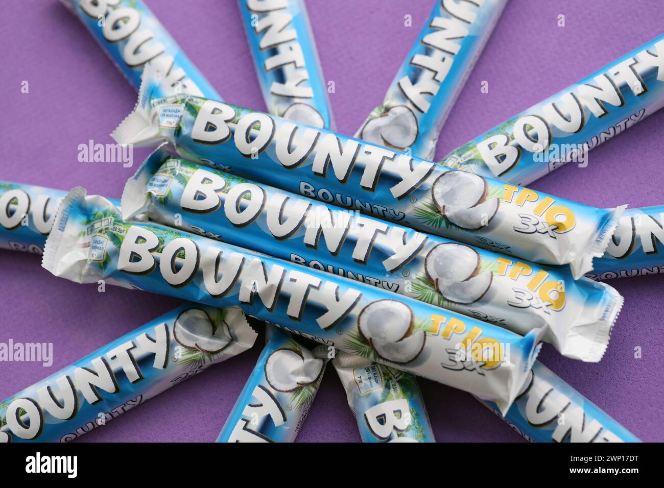 KYIV, UKRAINE - OCTOBER 31, 2023 Bounty chocolate bars with cocoa ...