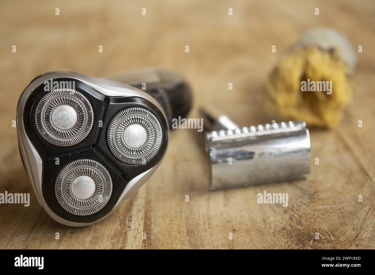 old electric razor with a shaving brush and a safety razor Stock Photo ...