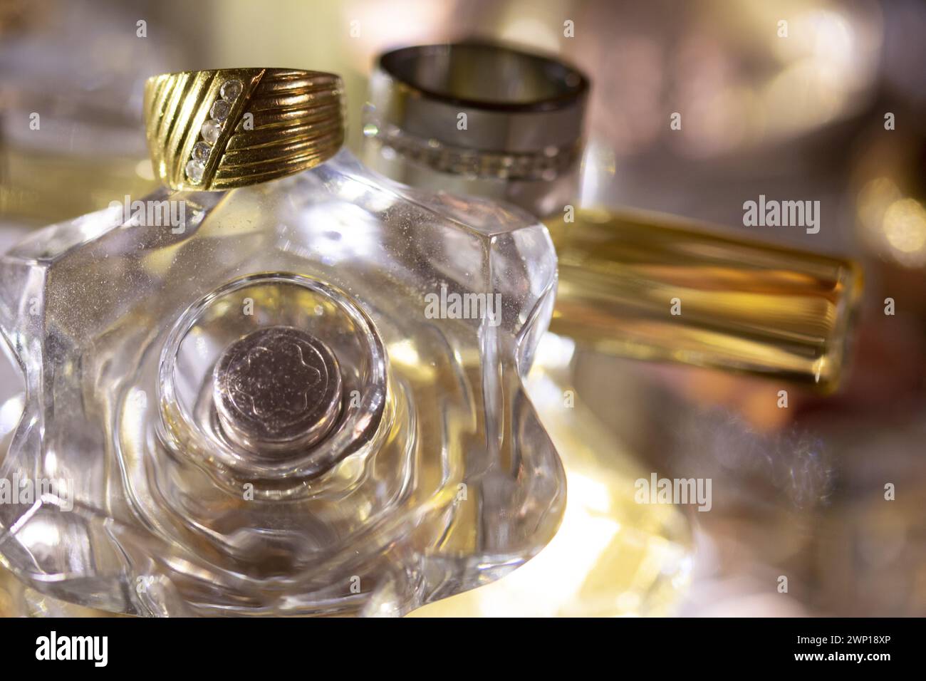 Hands holding a perfume bottle hi-res stock photography and images - Alamy