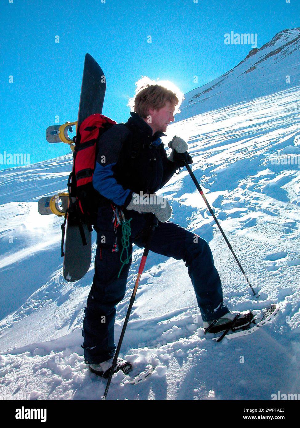 alpine snowboard tour in a white snowy landscape with blue sky alpine ...