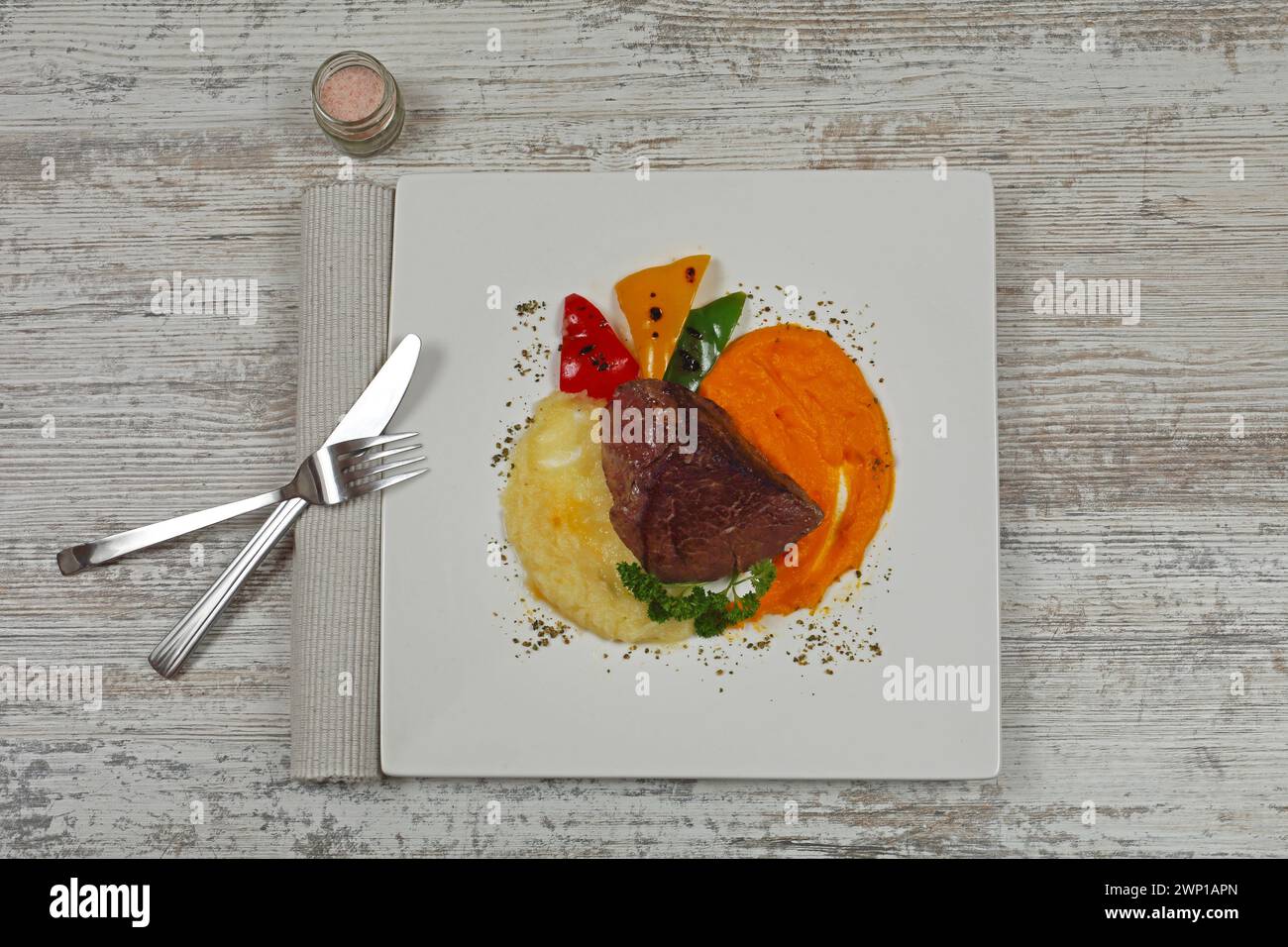Beef Steak With Pureed Potatoes and Carrots Tabletop Stock Photo - Alamy