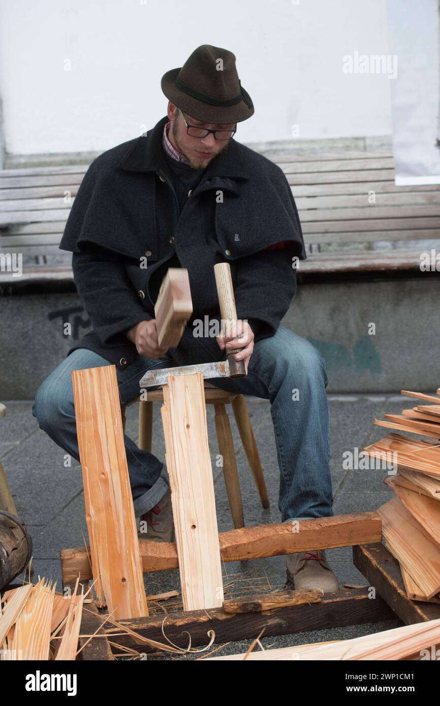 producing wooden roof shingles, a traditional craft, construction with ...