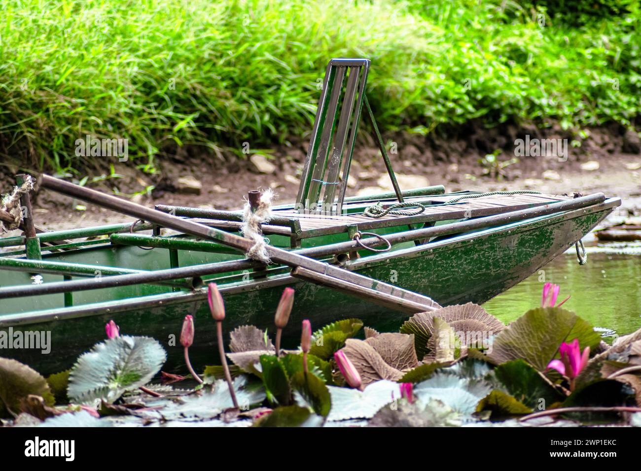 A boat stuck in a river near Hoa Lu Stock Photo - Alamy