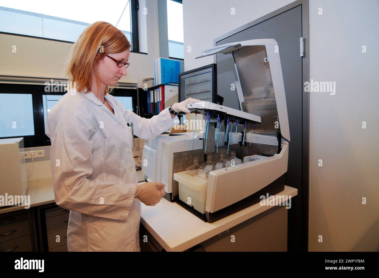 analyzing samples in a hospital lab, research in medicine and health ...