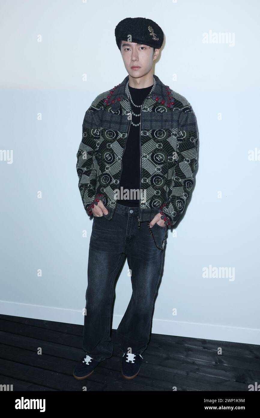 Wang Yibo attending the Chanel Womenswear Fall/Winter 2024-2025 show as ...