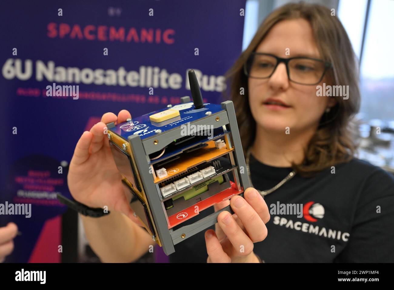 Brno, Czech Republic. 05th Mar, 2024. Natalia Gogolova shows model of satellite at Spacemanic ...
