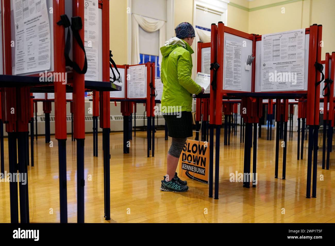A voter fills out a ballot in Kennebunk, Maine, Tuesday, March 5, 2024 ...