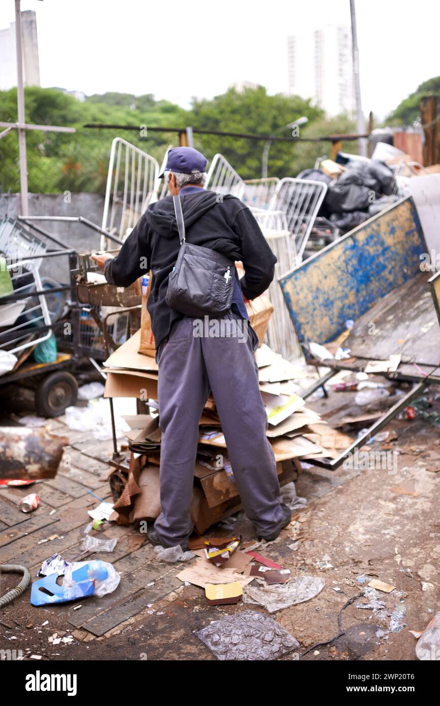 Man, worker and recycling of garbage for waste management in city with ...