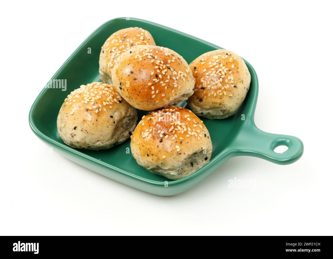 small round breads with sesame on white background Stock Photo - Alamy