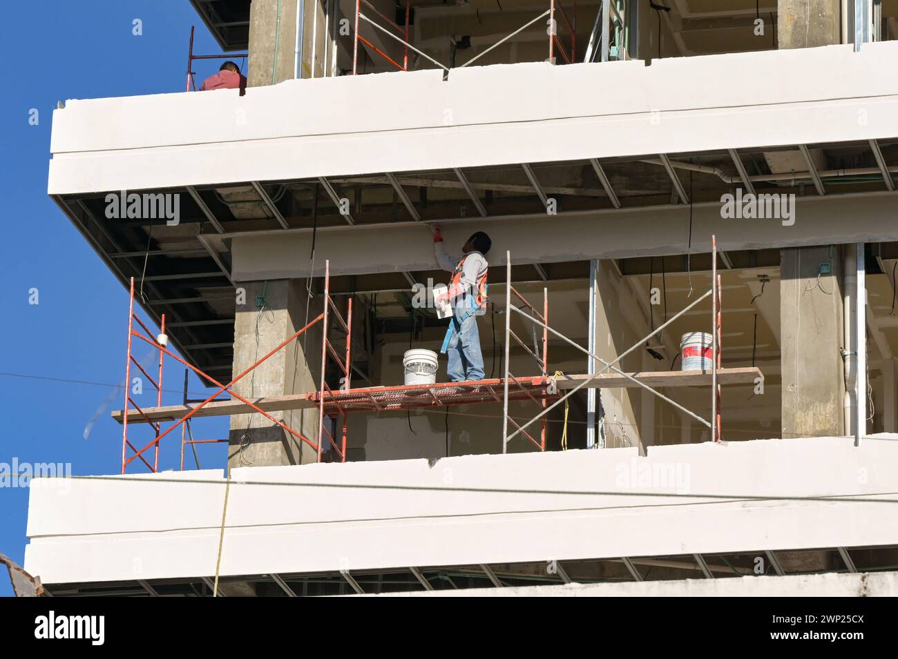 Puerto Vallarta, Jalisco, Mexico - 15 January 2024: Construction worker ...