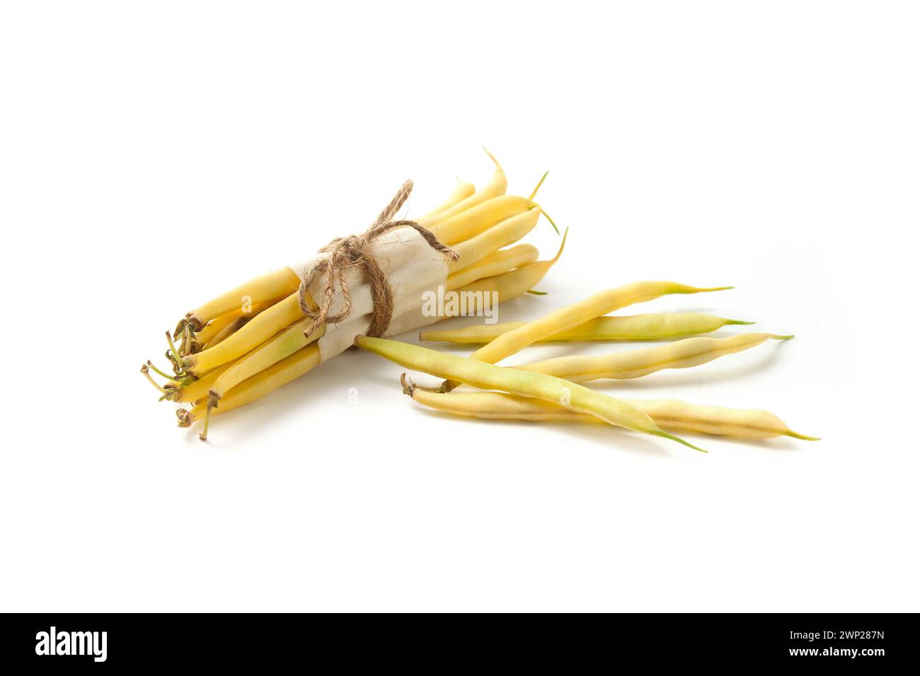 Bunch of raw yellow pods of haricot and several pods isolated on white ...