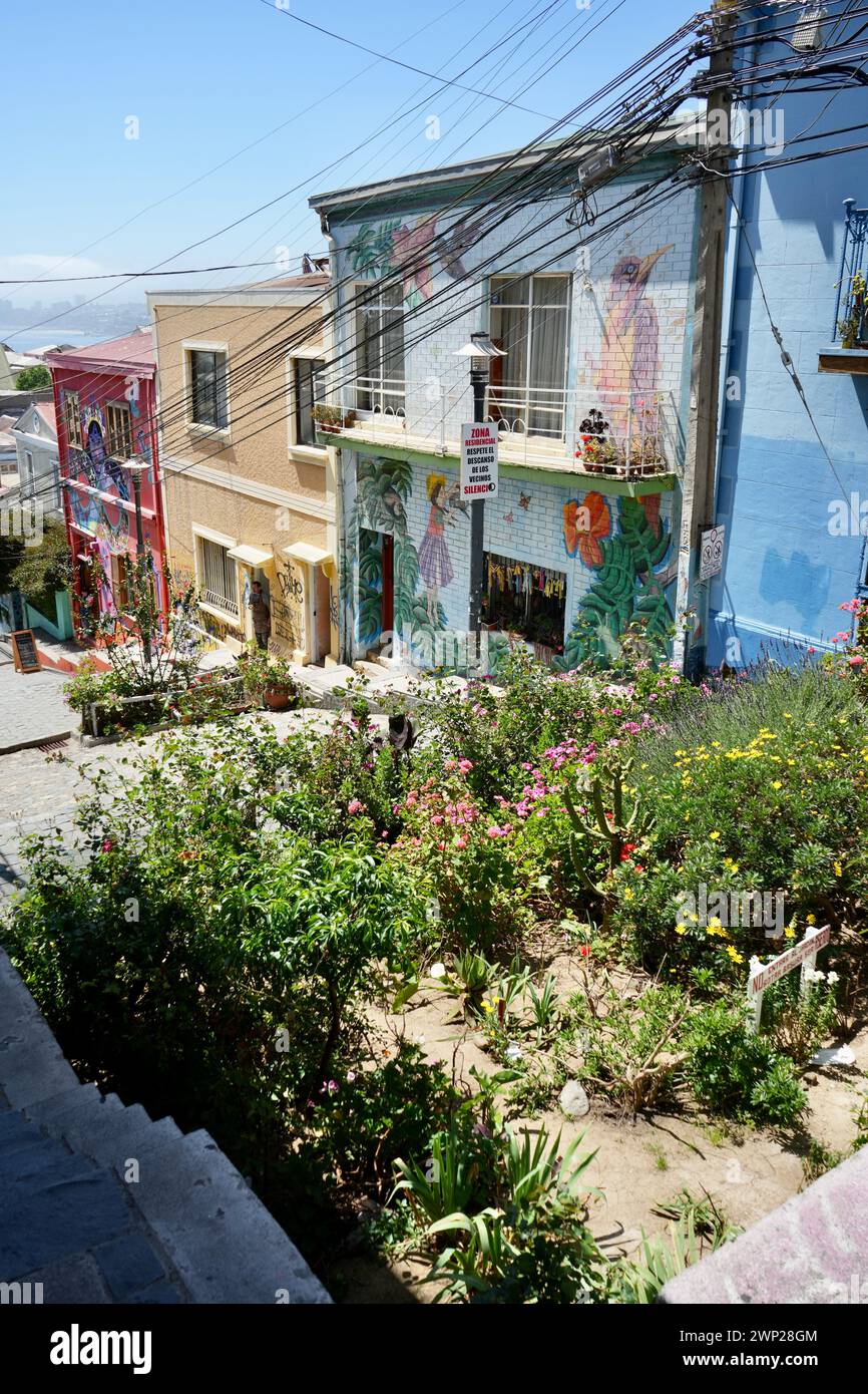 Steep street with colorfully painted houses Stock Photo - Alamy