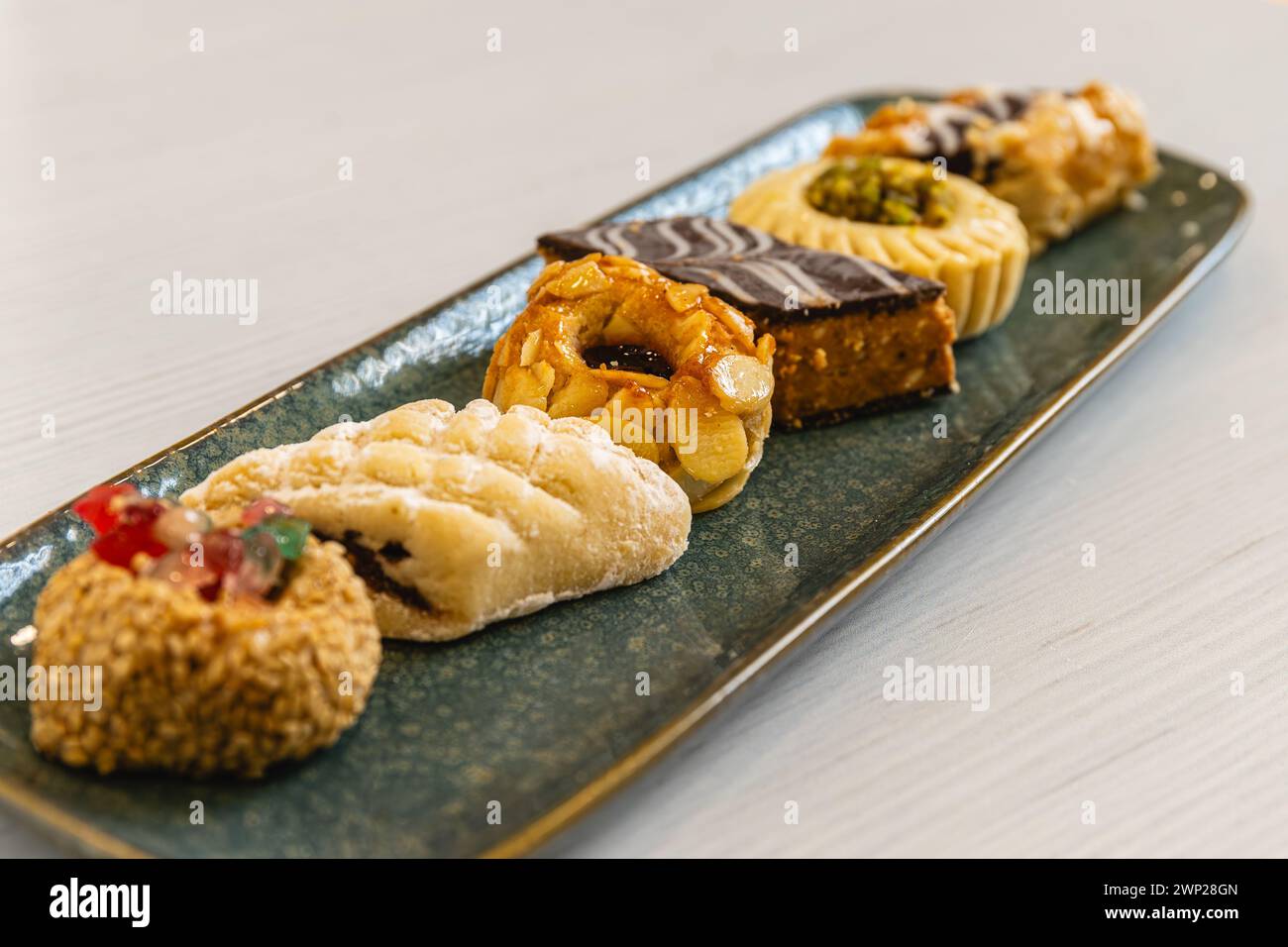 Horizontal photo a tasteful arrangement of Arabic pastry delicacies ...