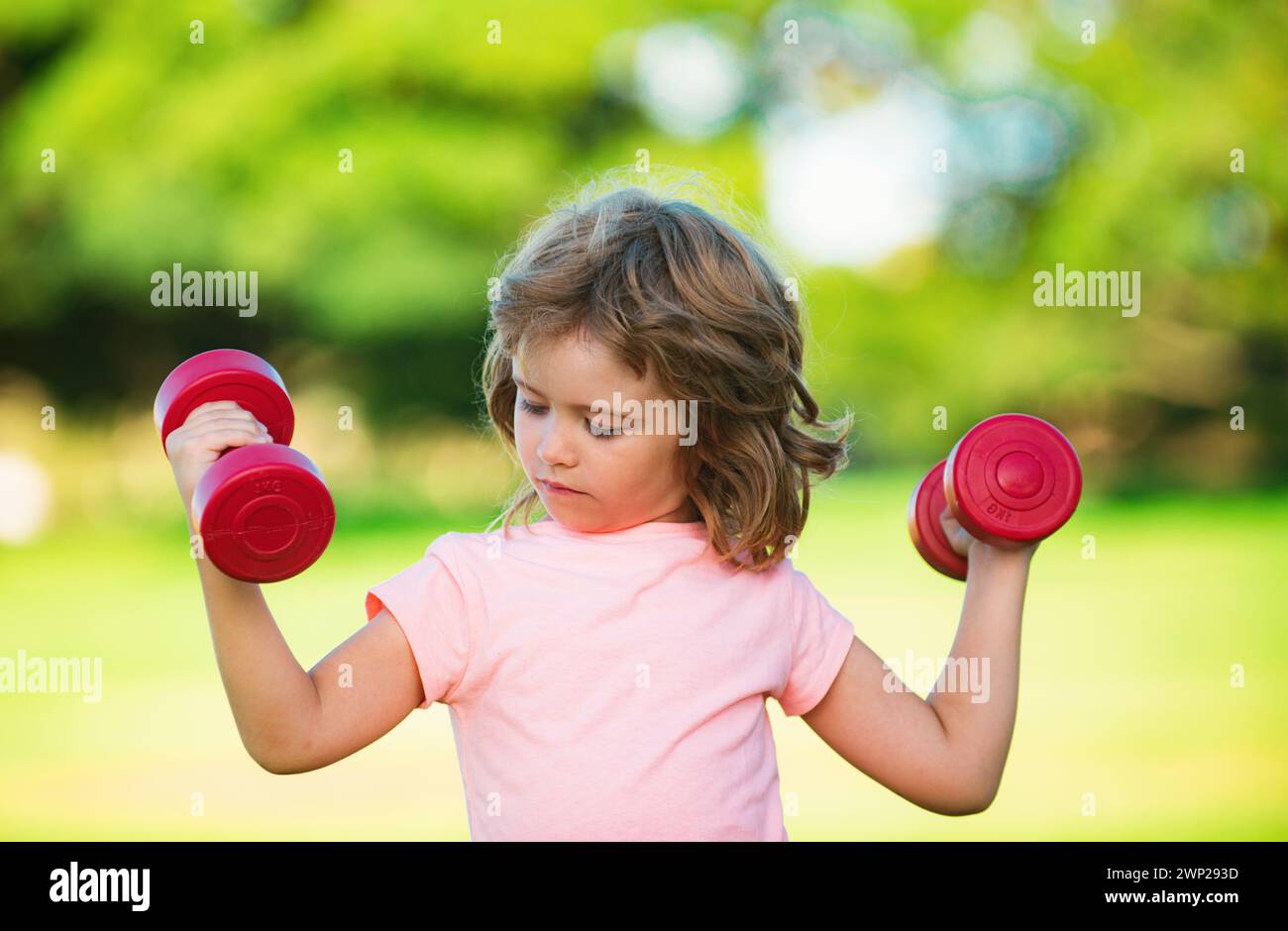 Kid exercising in park. Active boy, healthy lifestyle. Sport child with ...