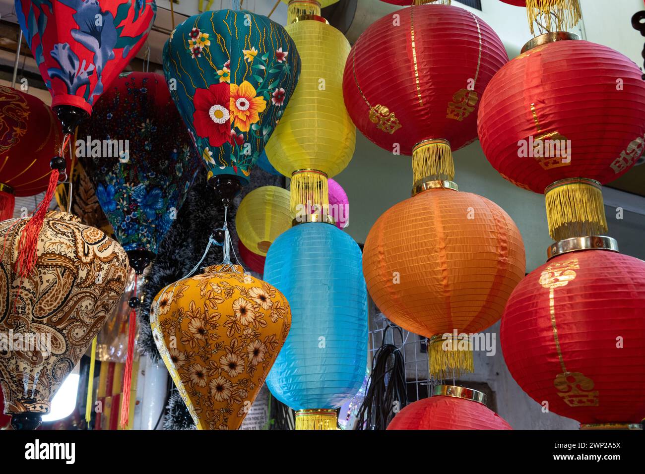 Traditional Vietnamese silk lantern light covers in various colors and ...
