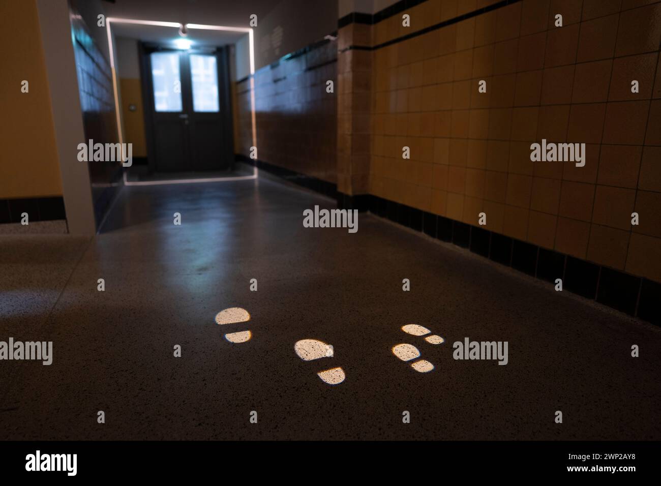 Illuminated footsteps show the escape route used to spirit some 600 ...