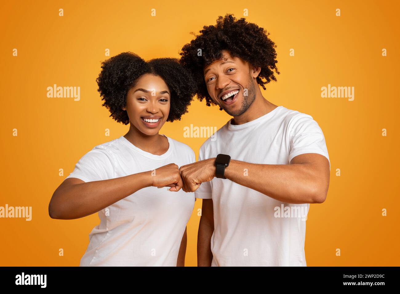 Two hands doing fist bump hi-res stock photography and images - Alamy