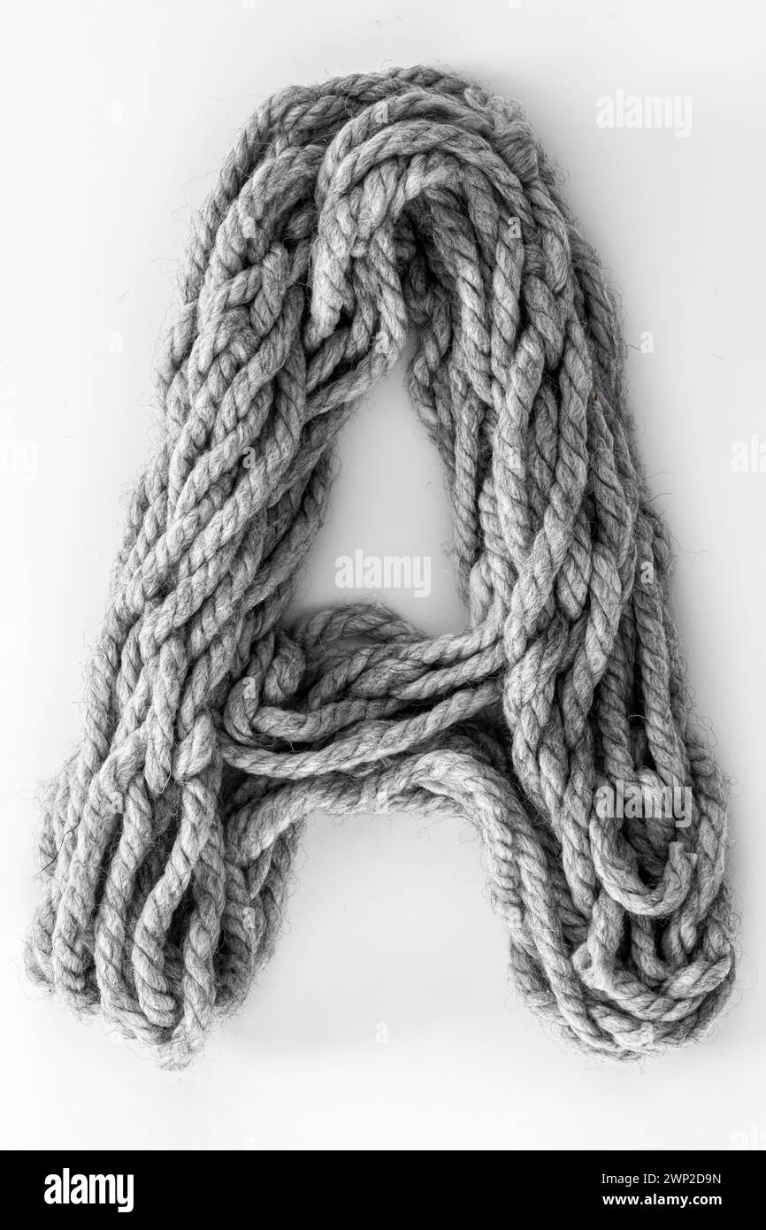 Letter A made from gray threads isolated, top view Stock Photo - Alamy