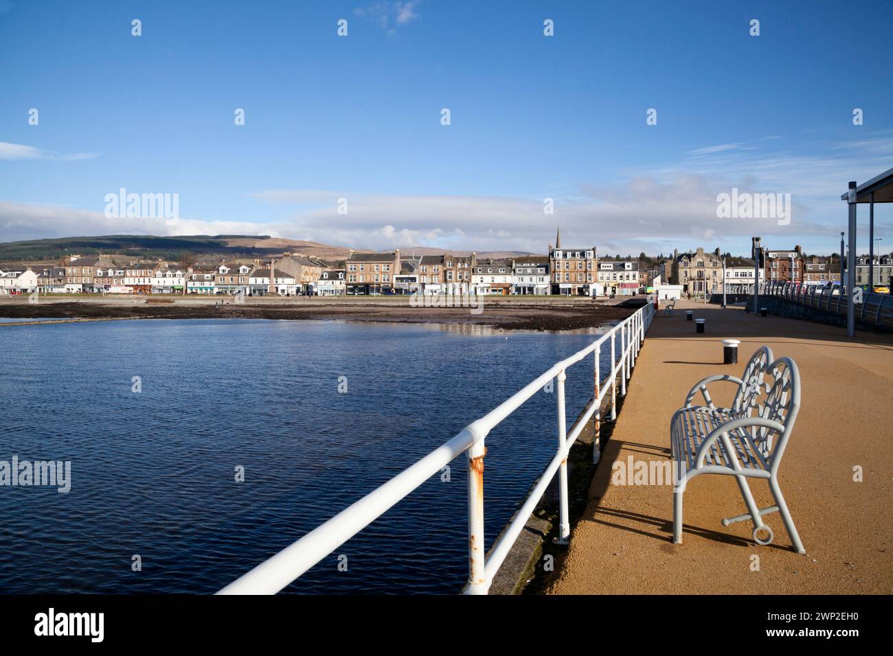 View along Helensburgh Pier to the seafront and shops Stock Photo - Alamy