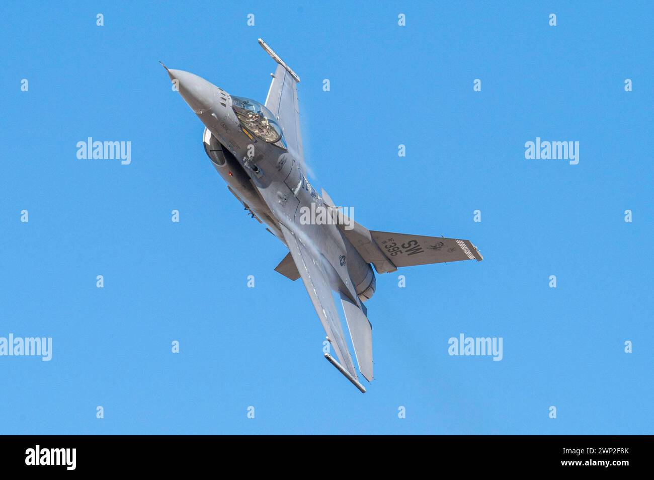 An F-16 Fighting Falcon aircraft flies during the Heritage Flight ...