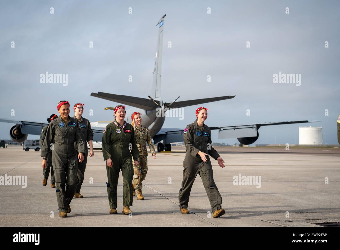 Airmen assigned to the 6th Air Refueling Wing walk the flight line at ...